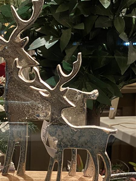Pair of silver metal reindeer ornaments